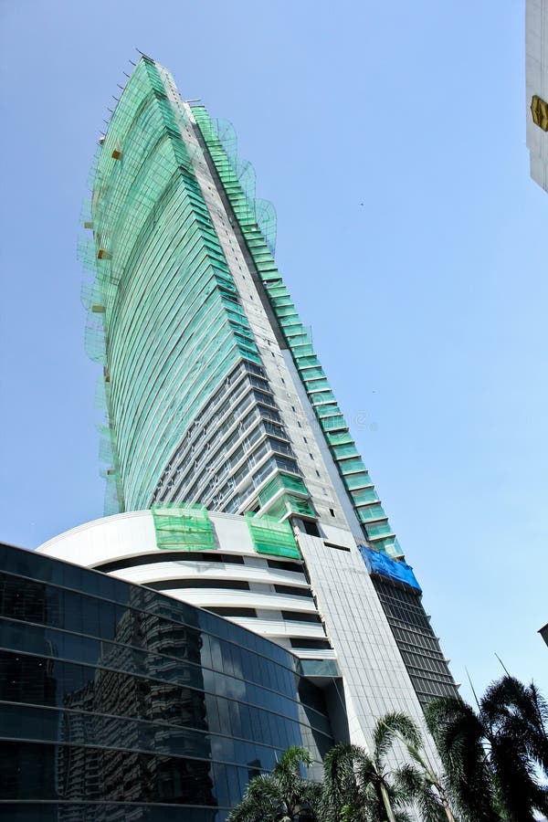 Construction and Sky-scraper Building and Crane Against Colorful Sky ...