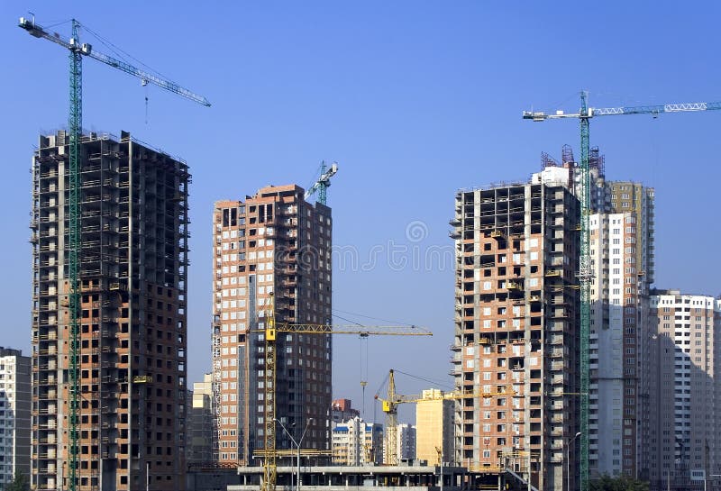 Sky-scrapers Building Cranes Stock Image - Image of activity ...