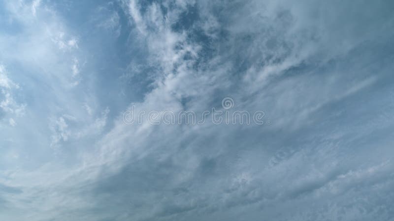 Sky with Several Layers of Clouds Moving in Different Directions. Sun ...