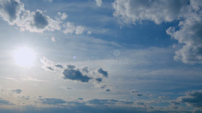 Sky with Several Layers of Clouds Moving in Different Directions. Sun ...