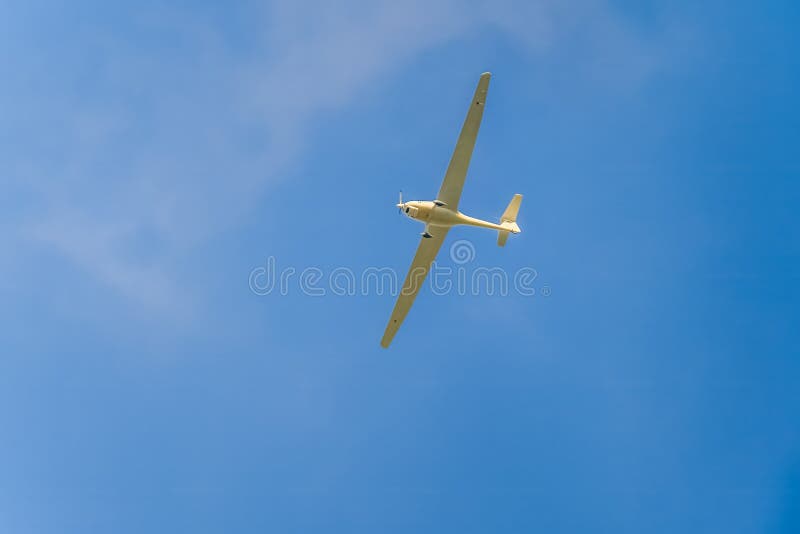 Glider with Engine Flying in Blue Sky Stock Image - Image of transport ...
