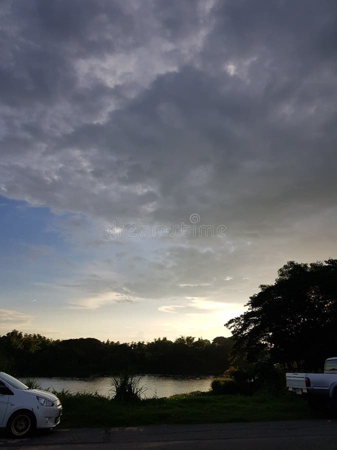 Sky stock image. Image of tree, dark, river, light - 156001303