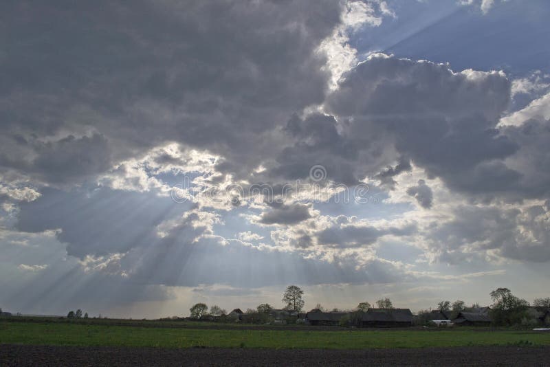 The Sun S Rays Fall through the Clouds To the Ground Stock Image ...