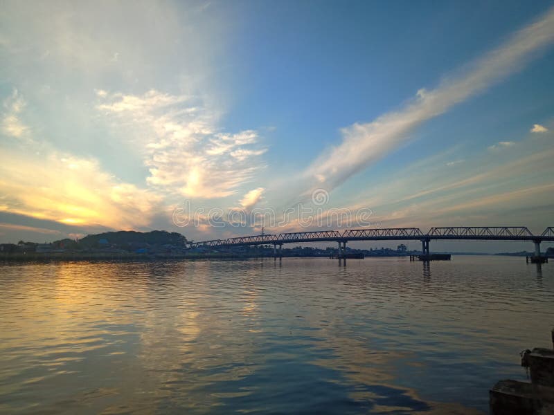 The Sky when the Sun Will Rise in the River in the Bridge Stock Photo ...