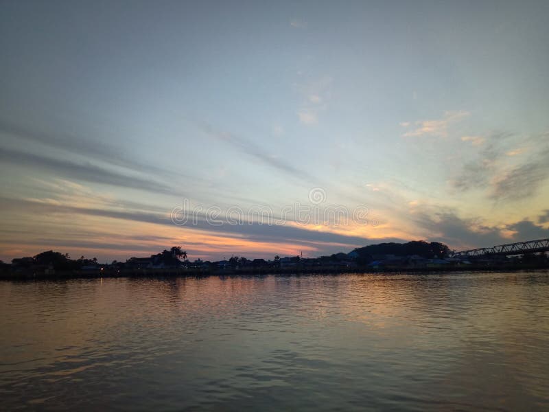 The Sky when the Sun Will Rise in the River with the Bridge Stock Photo ...