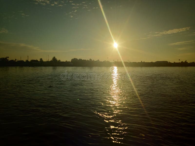 The Sky and the Sun Will Rise in the River Stock Photo - Image of ...