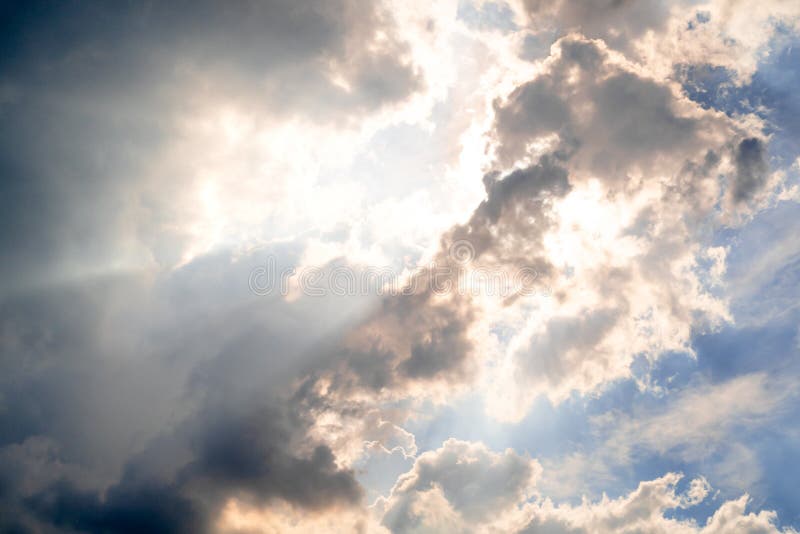 The Sky with Sunlight Shining through the Rain Clouds Stock Image ...