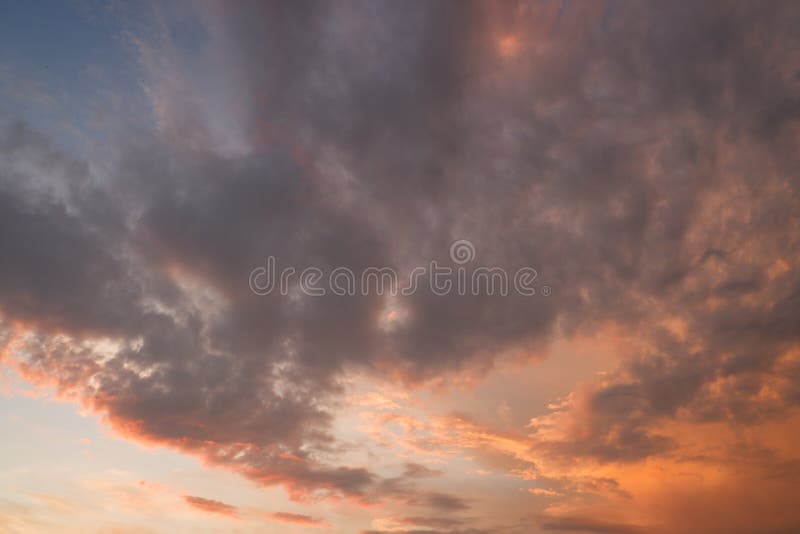 The Sky at Sunset before Bad Weather. Low Red Sunlight Illuminates ...