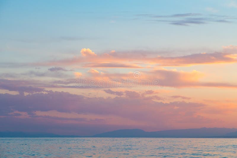 Sky Sunset Sea. Beautiful Clouds, Soft Colors. Natural Background Stock ...