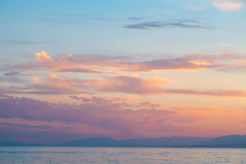 Sky Sunset Sea. Beautiful Clouds, Soft Colors. Natural Background Stock ...