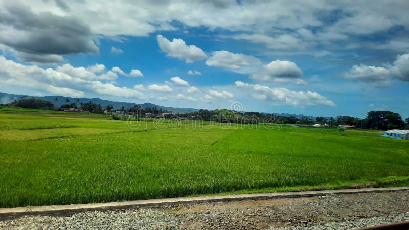 Sky View with Clouds, Rice Fields and Train Tracks, East Java Indonesia ...