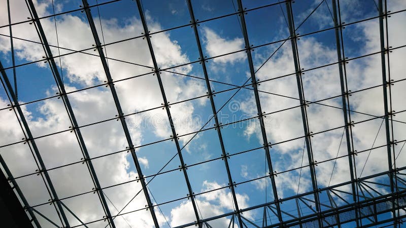 Sky View through a Grid Glass Roof Stock Image - Image of buildings ...