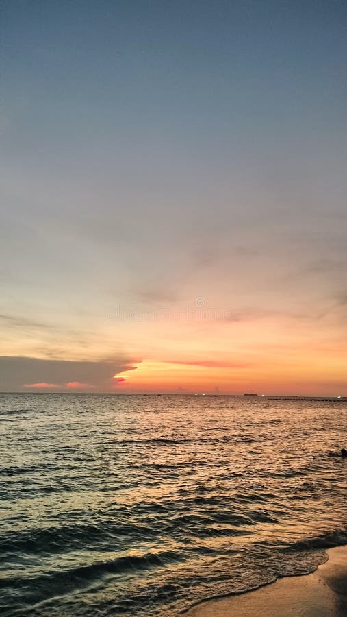 Sky wave dusk sea sun stock photo. Image of wave, dusk - 376980688