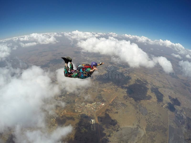 Skydiver in action stock photo. Image of skill, skydiving - 54349066