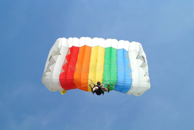 Parachuter, Skydiver Jumping and Skydiving with Colorful Parachute in ...