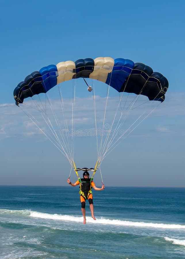 Skydiver Flying Over the Beach. Stock Photo - Image of adventure ...