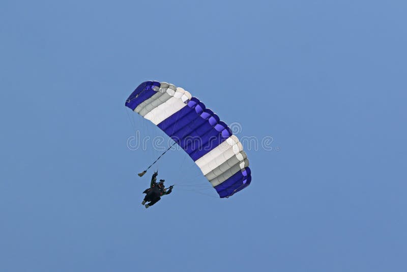 Skydiver Flying Wing in a Blue Sky Stock Image - Image of skydiver ...