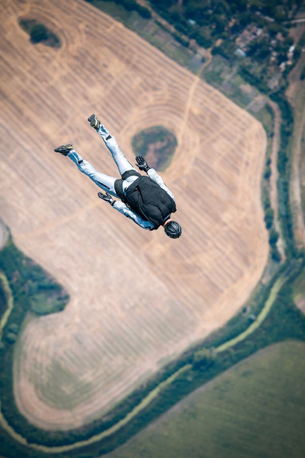 Skydiver Free Falling Upside Down Portrait View from Below Stock Image ...