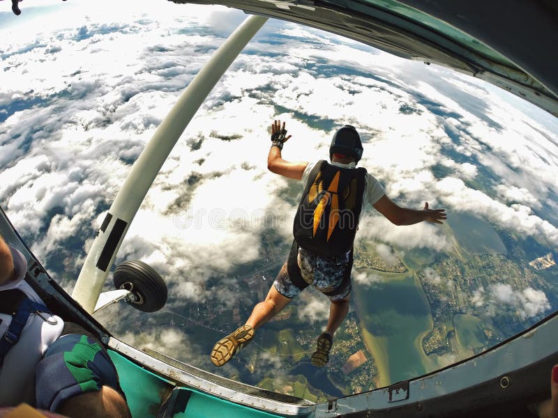 Skydiver Jump Out of Plane Over the Beach. Stock Image - Image of ...