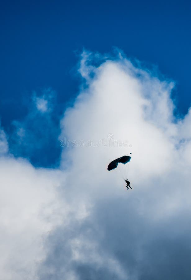 Skydiver Jumping from a Helicopter at High Altitude Stock Image - Image ...