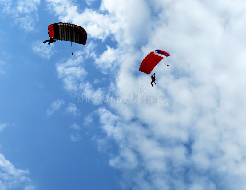 Skydivers Jump from an Airplane in the Sky. Stock Photo - Image of ...