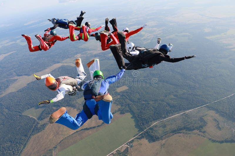 Formation Skydiving. Skydivers are Falling in the Sky. Editorial Photo ...