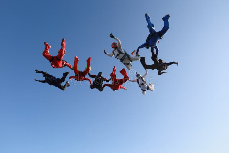 Formation Skydiving. Skydivers are Falling in the Sky. Editorial Stock ...