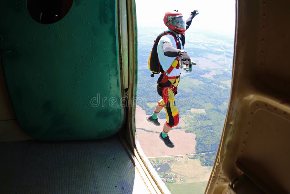 Skydiving. the Moment of Exit. Stock Image - Image of skydive, risk ...