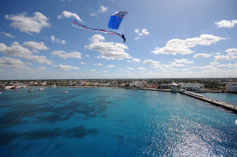 Skydiving over a coastline stock image. Image of skydiver - 21252837