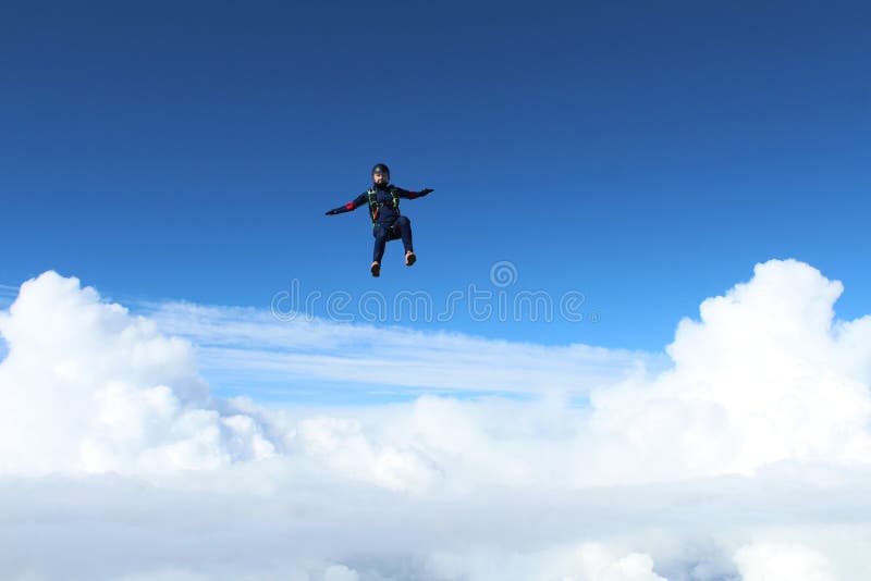 Skydiving. a Solo Skydiver is Flying in the Sky. Stock Image - Image of ...