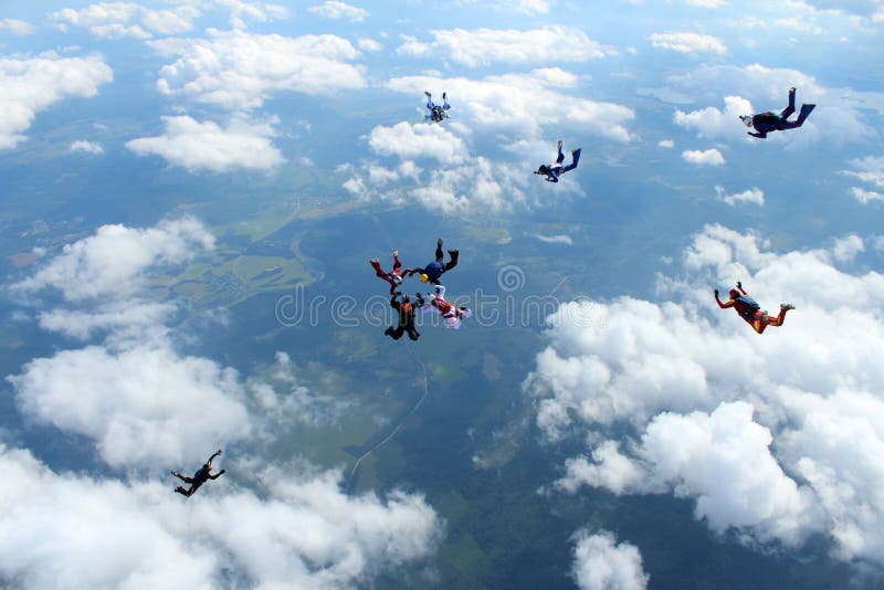 Skydiving. Skydivers are Flying in the Sky Like a Flock of Birds. Stock ...