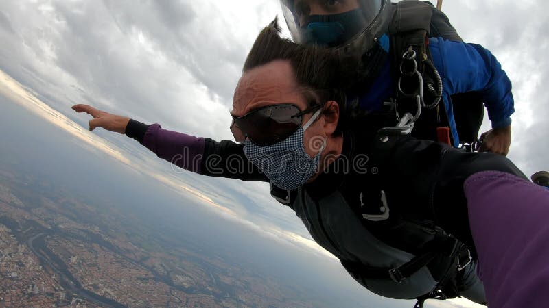 Skydiving Tandem with Protective Mask after the Lockdown Stock Photo ...