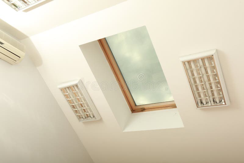 Skylight Roof Window on Slanted Ceiling in Attic Room, Low Angle View ...