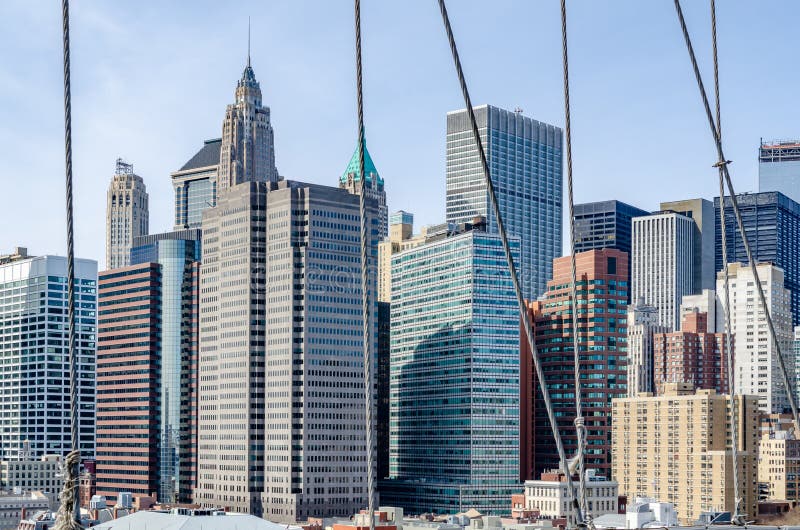 Skyline of Manhattan with Wire Ropes of Brooklyn Bridge in the ...