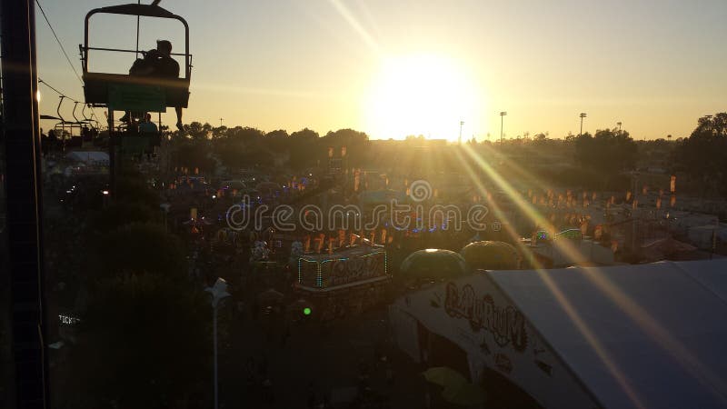 Fair at sunset stock image. Image of summer, rides, fair - 22919