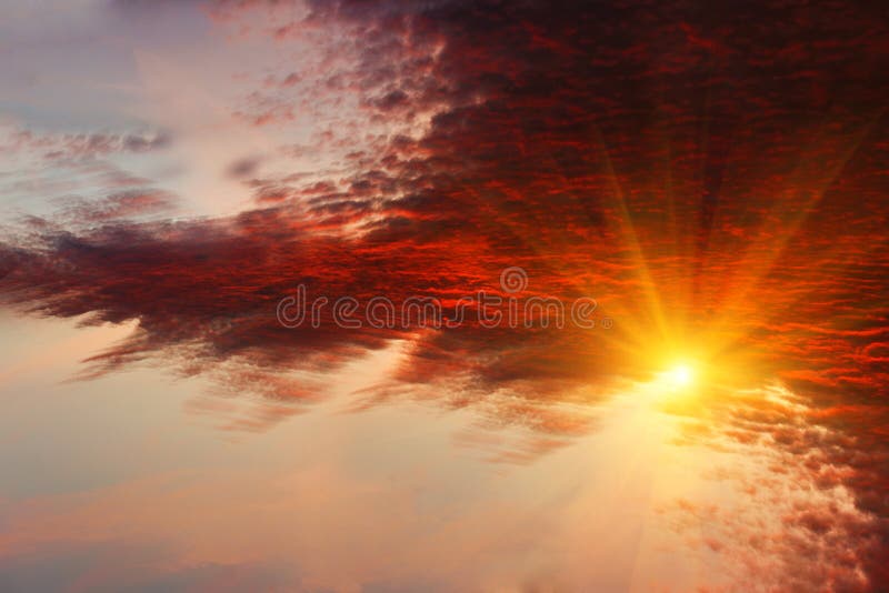 Skyline of Sun Rays through Fiery Red Clouds on the Sunset. Stock Image ...