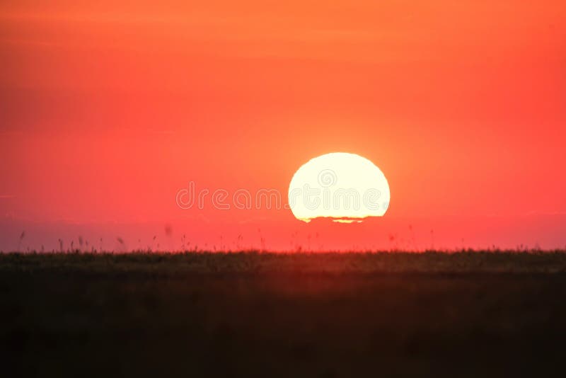 Horizon Line with Sun Setting Stock Image - Image of outdoors, glowing ...