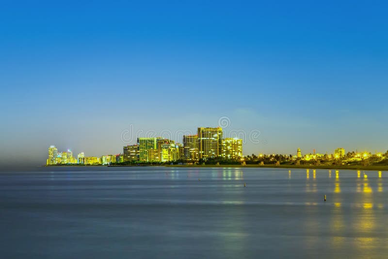 Skyline of Sunny Isles Beach by Night with Reflections at the Surface ...