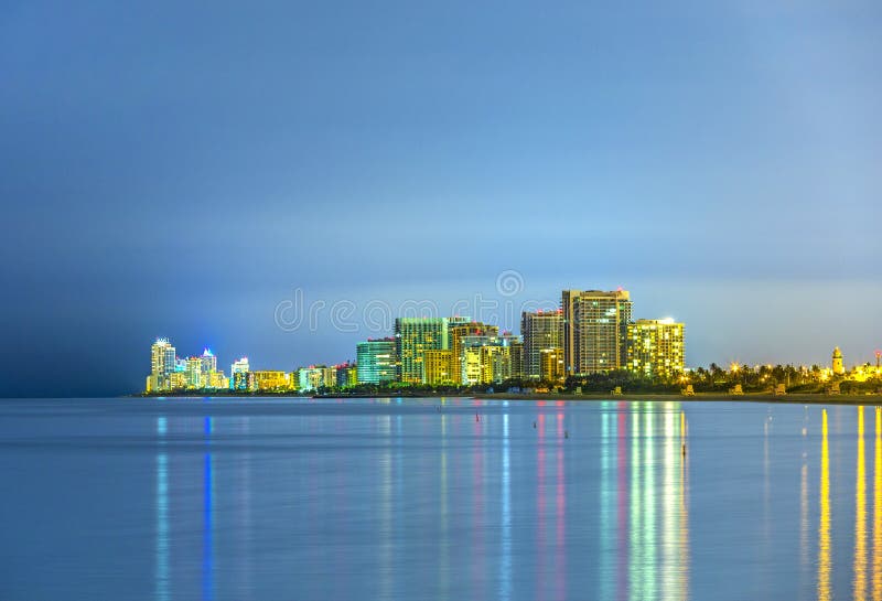Skyline of Sunny Isles Beach by Night with Reflections at the Surface ...