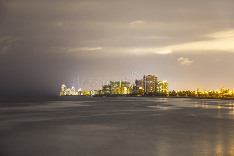Skyline of Sunny Isles Beach by Night with Reflections at the Surface ...