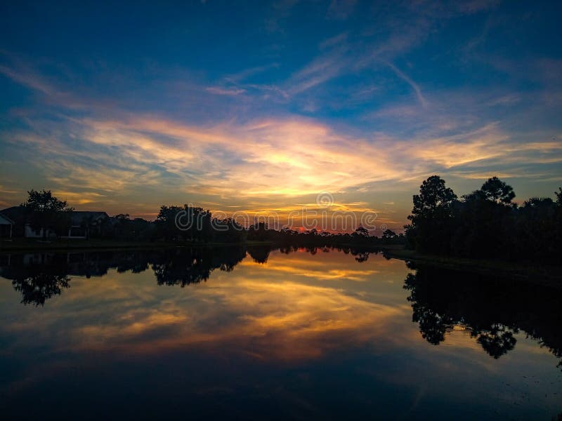 Skyline sunrise mirror stock image. Image of skyline - 129661453