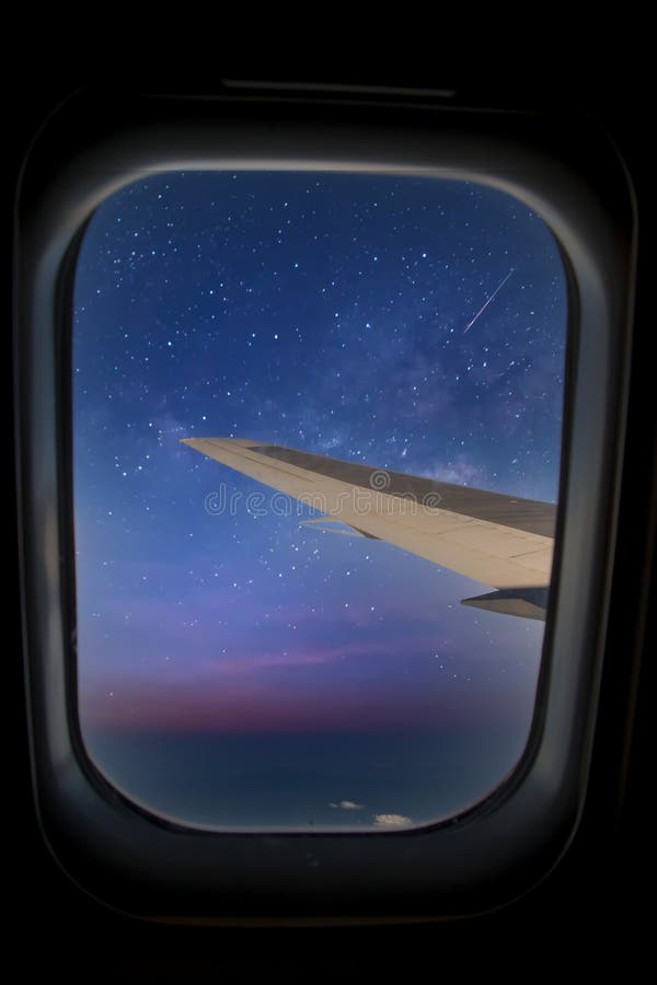 Skyscape Through Aeroplane Window During Flight In Wing With Blue Sky ...