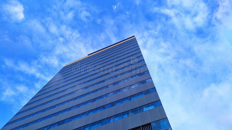 Skyscraper with Blue Sky Background Stock Photo - Image of ground ...
