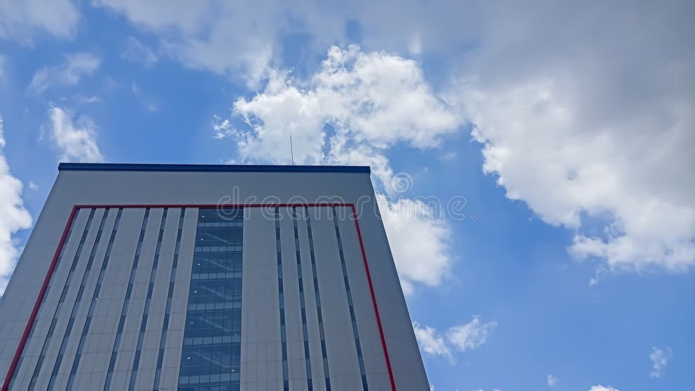 Skyscraper Building with Blue Sky Background Seen from Below Stock ...