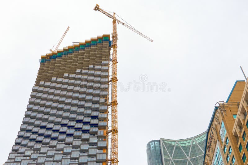 Building Construction, the Building Covered with a Grey Tarpaulin ...