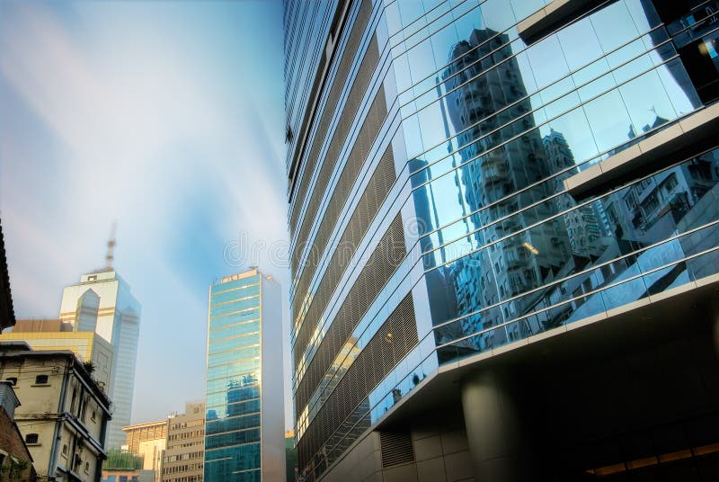Skyscraper with clouds stock image. Image of kong, business - 12156379