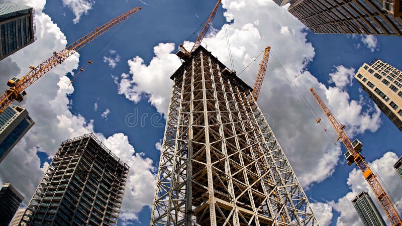 Skyscraper Construction Progressing Under a Cloudy Sky Stock Footage ...