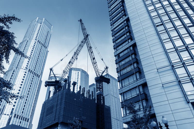 Skyscraper Construction Site Stock Photo - Image of equipment, crane ...