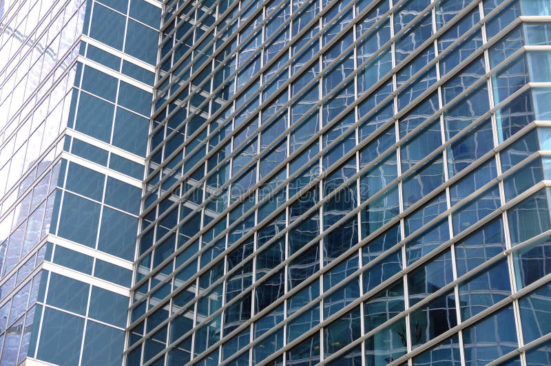 Skyscraper Facade with Glass Facade and Reflections Stock Photo - Image ...