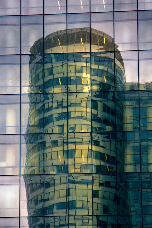 Skyscraper of Glass and Metal is Reflected in the Mirror Wall of ...